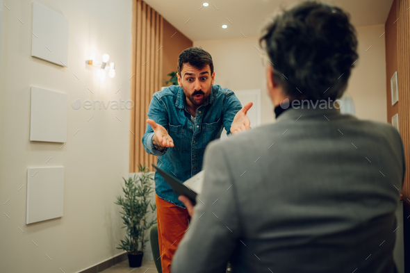 An aggressive client is explaining trauma in a psychotherapist's office. Stock Photo by ...